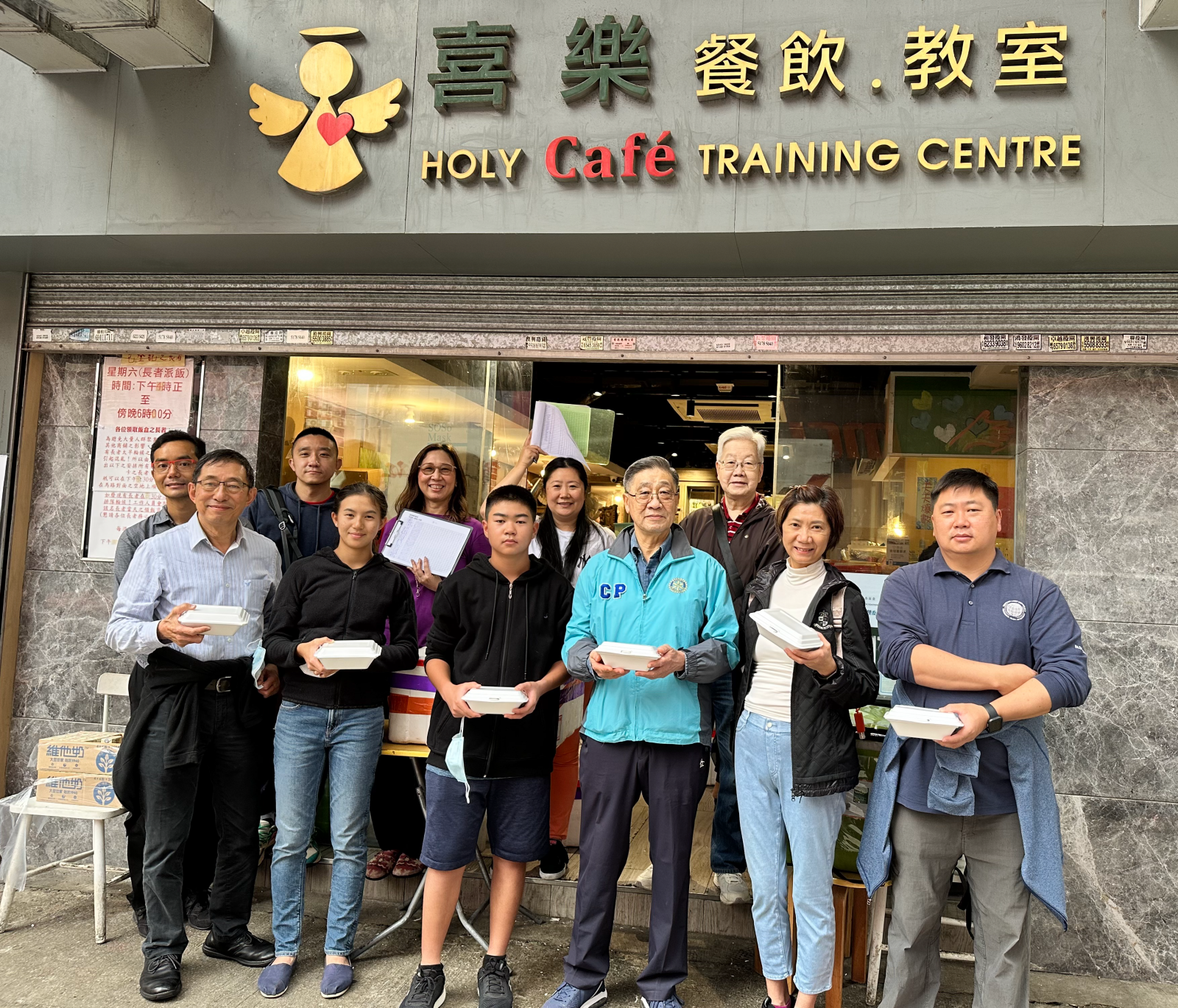 Hot meal distribution at Holy Cafe - Rotary Club of Hong Kong Harbour